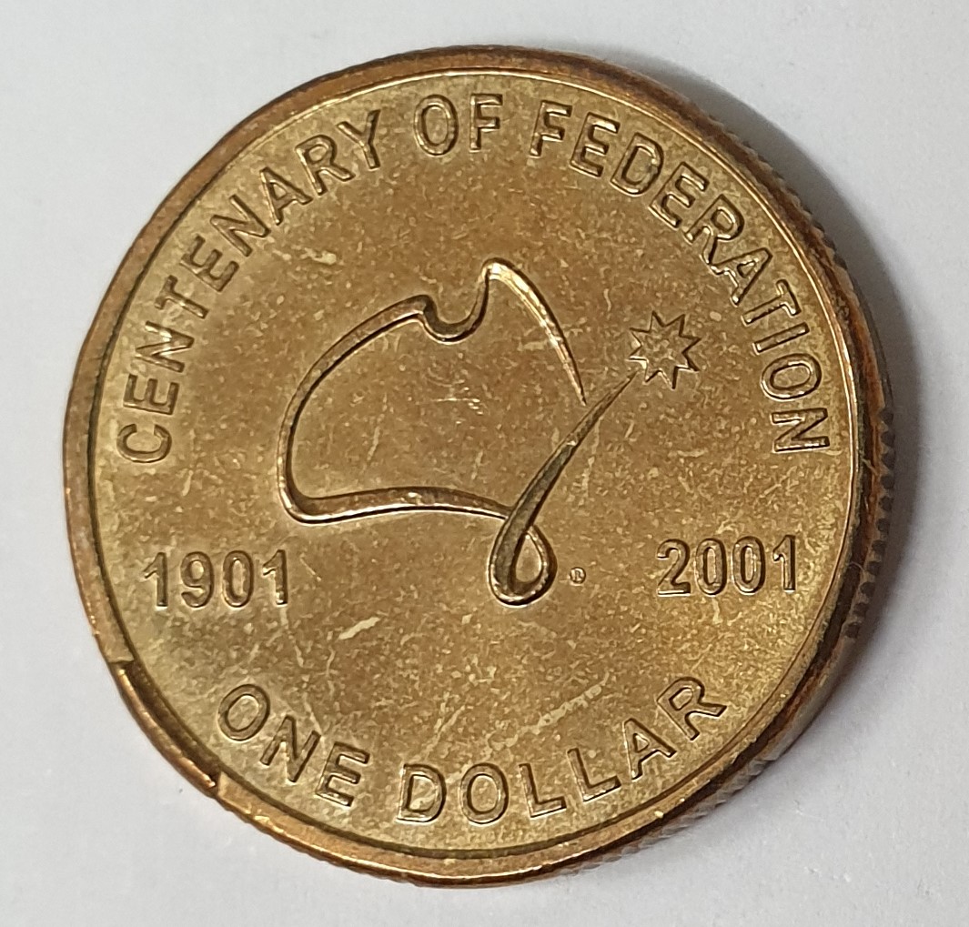 AUSTRALIA 2001 . ONE DOLLAR COIN . ERROR . MINOR OFF CENTRE ON REVERSE