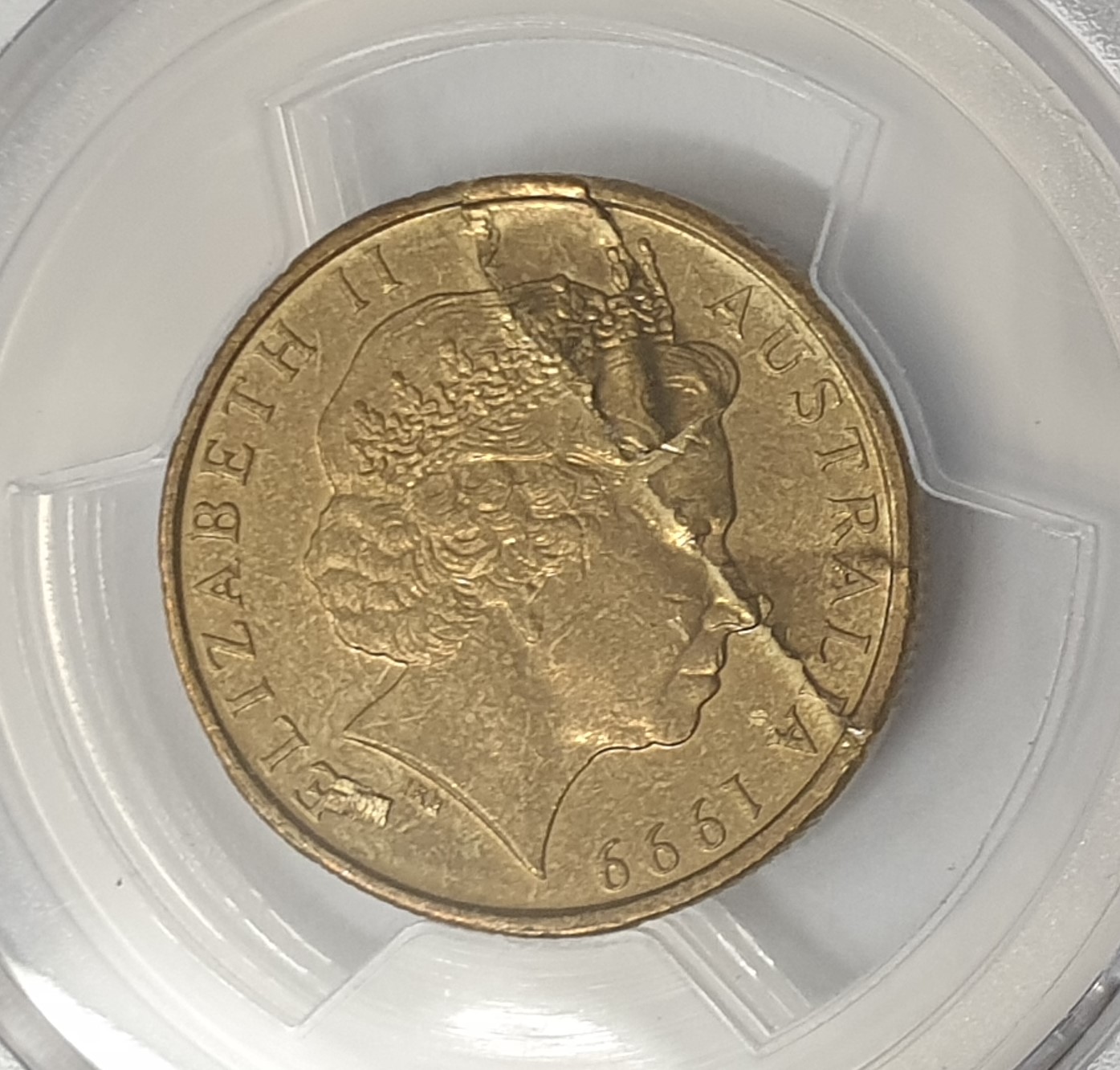 AUSTRALIA 1999 . ONE DOLLAR COIN . ERROR . MAJOR SPLIT PLANCHET